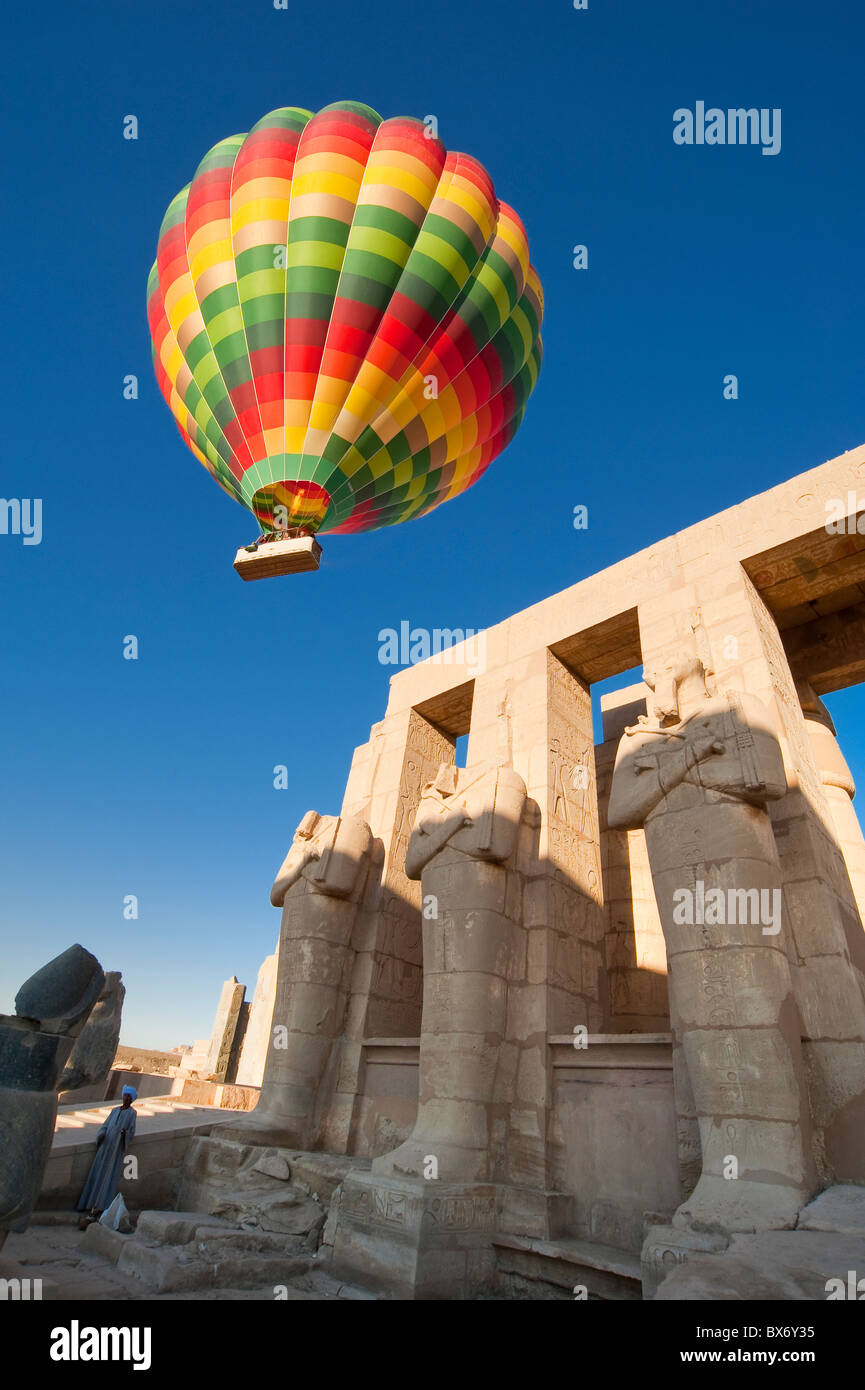 A beautiful and colourful hot air balloon floats gently over the ...