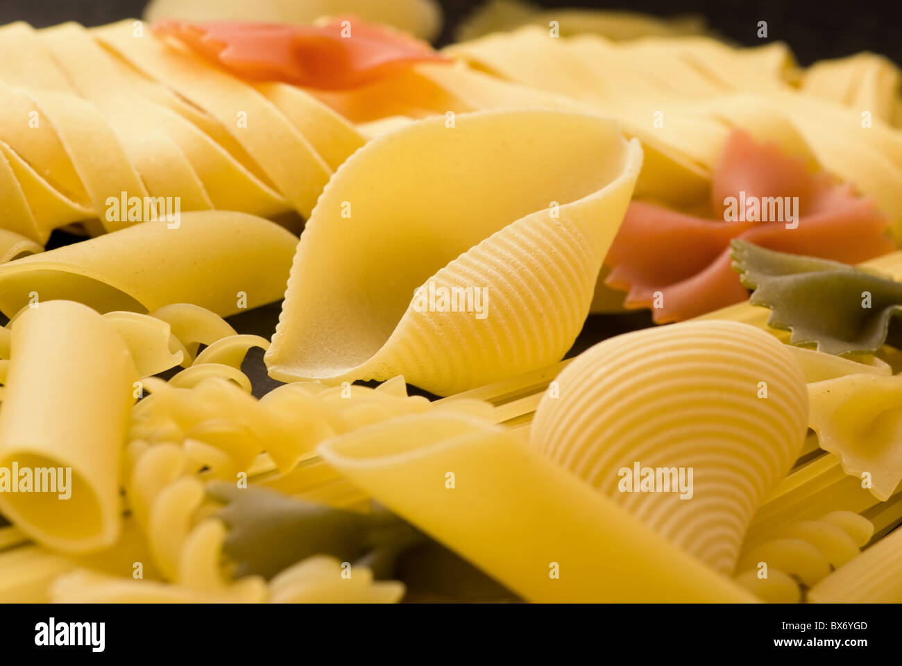 Collection of different Italian pasta as closeup on wood Stock Photo ...