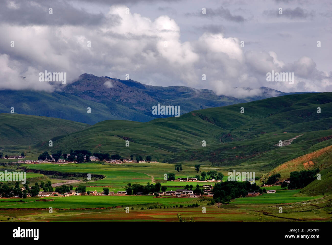 valley with farms and mountain ranges in background,sichuan,china Stock ...