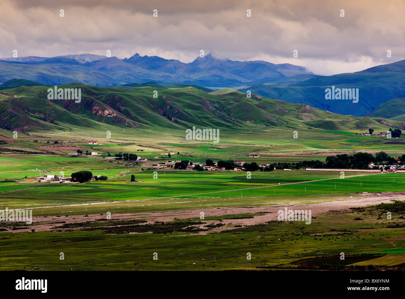 valley with farms and mountain ranges in background,sichuan,china Stock ...