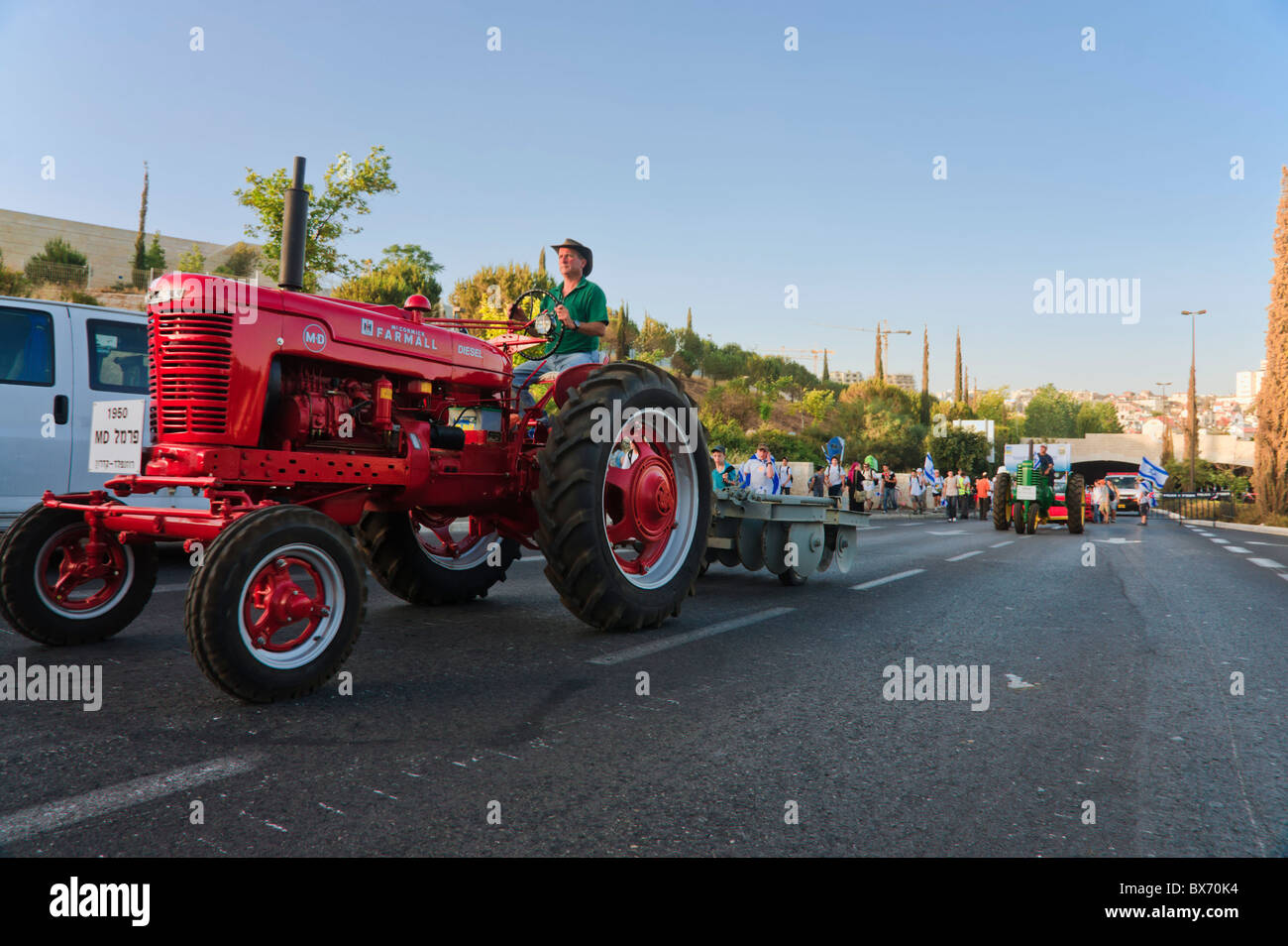 Jerusalem, Israel. Old tractors on Parade, with plows behind the ...