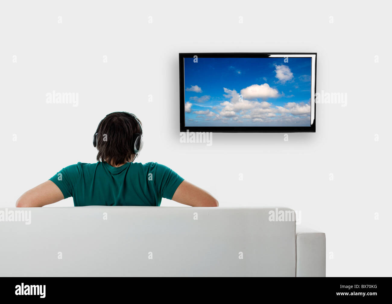 Rear view head watching television hi-res stock photography and images ...