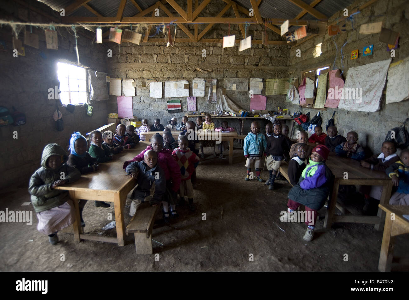 Nursery class in dirt floored classroom, St. Peter's Huruma Primary School, Olkalou, Rift Valley ...