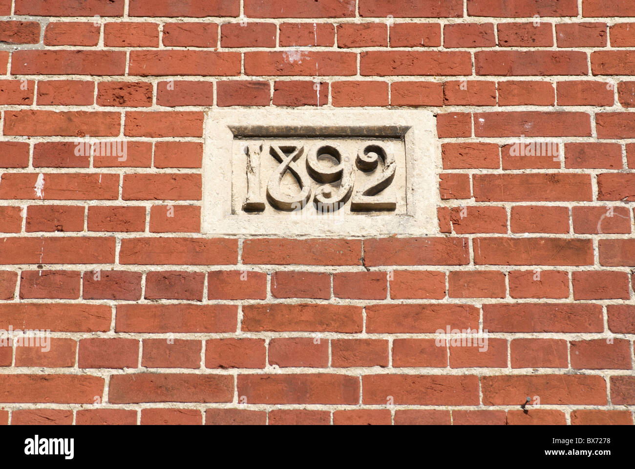 1892 sign on brick building Stock Photo - Alamy