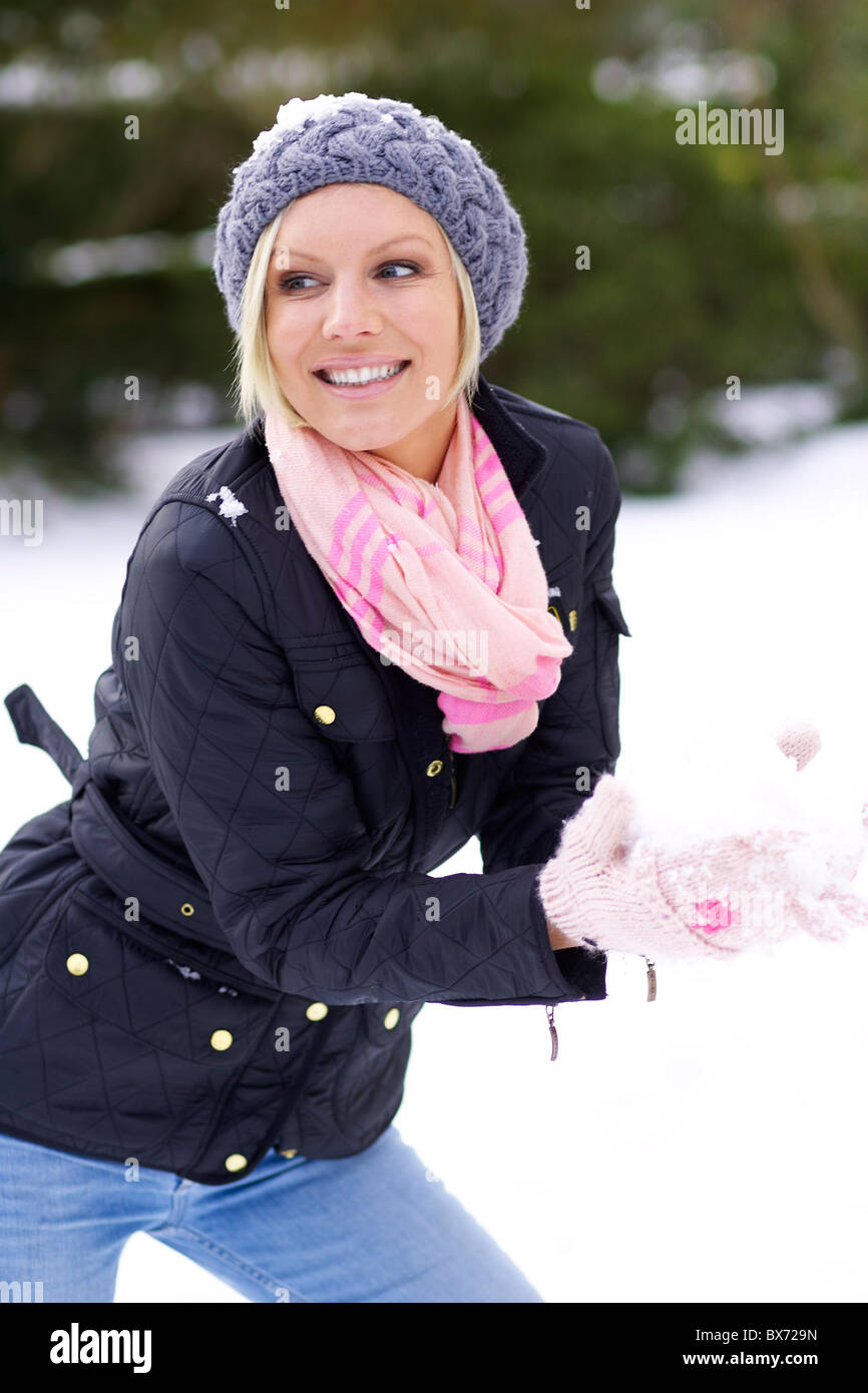 Woman in snow having fun Stock Photo - Alamy