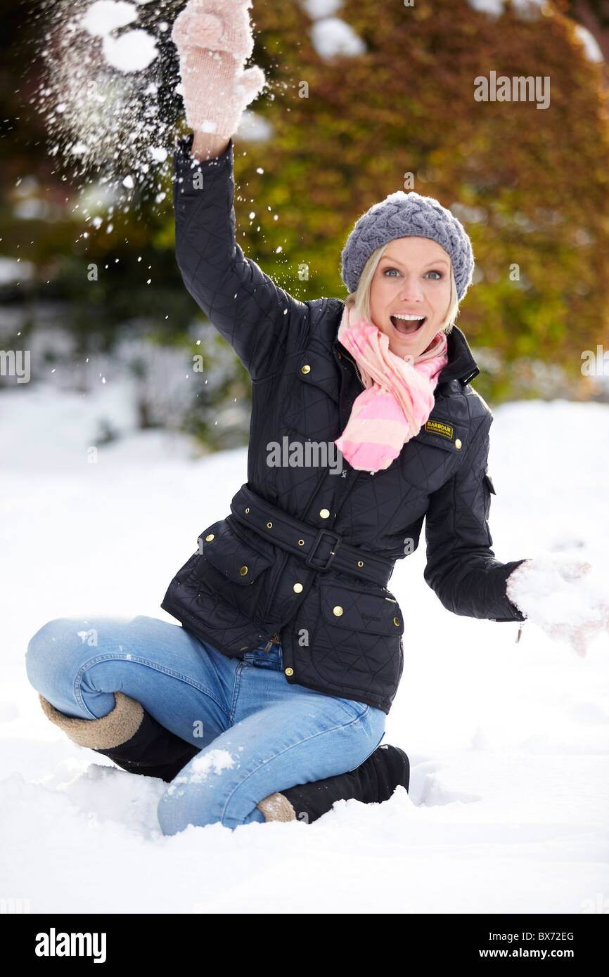 Woman in snow having fun Stock Photo - Alamy
