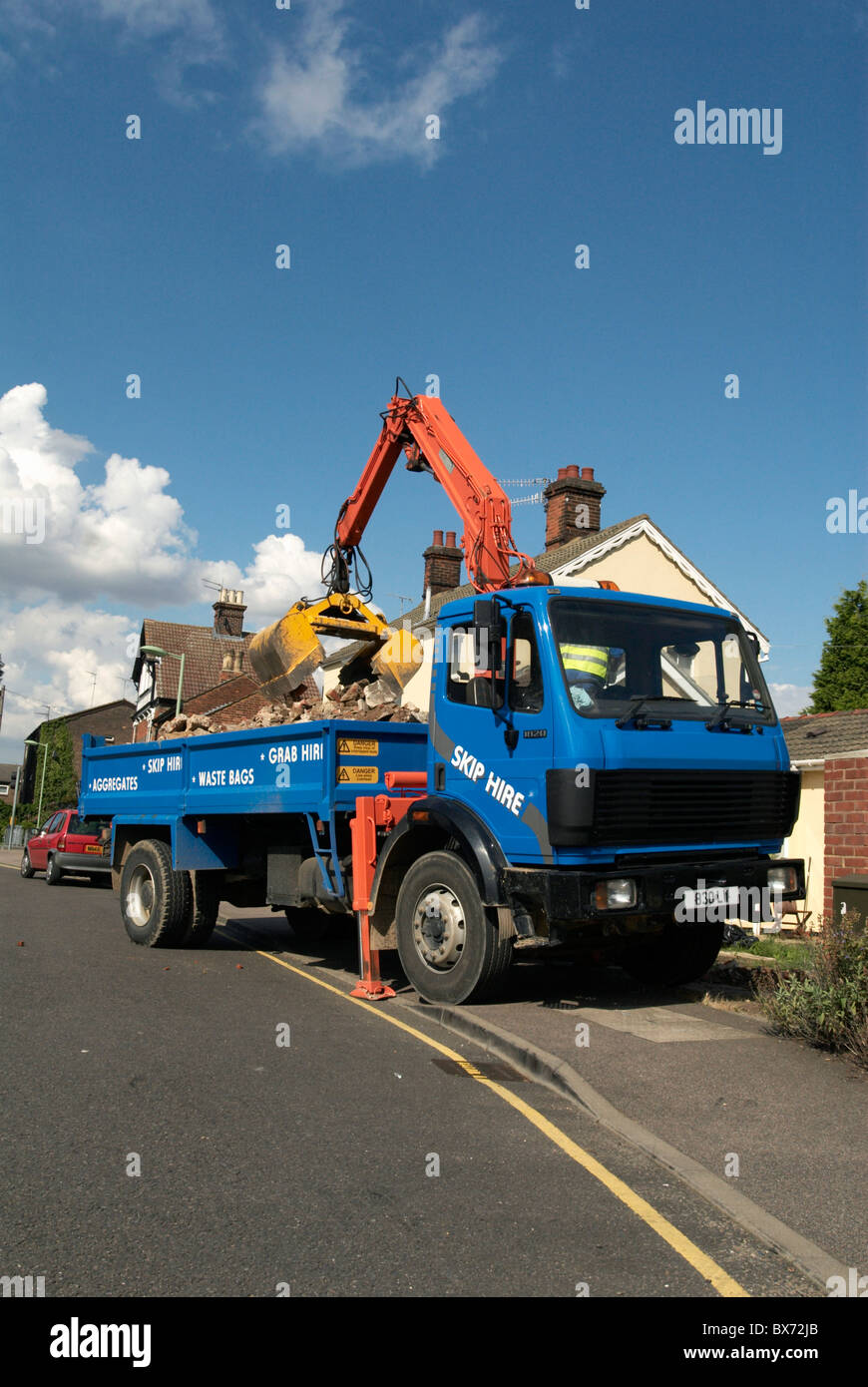 Lorry loading aggregate with a excavating arm Ipswich UK Stock Photo ...