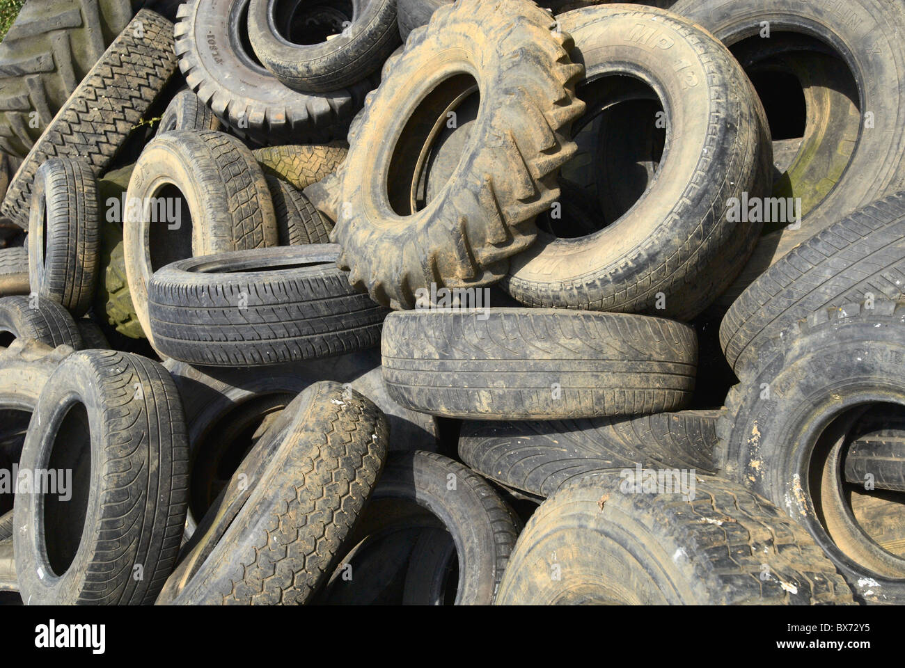 Stack of old tyres Stock Photo - Alamy