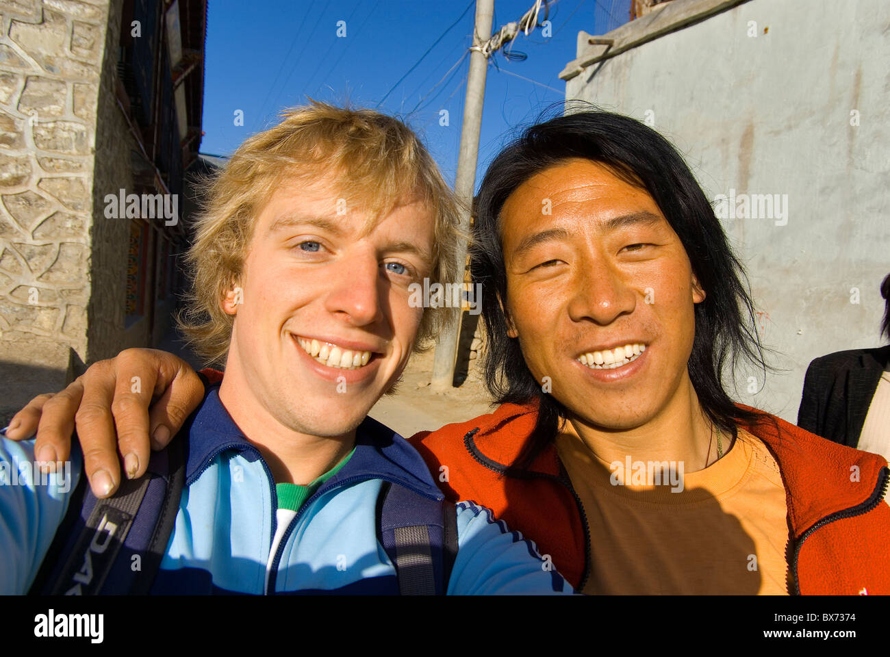 tourist and tibetan man,sichuan,china Stock Photo - Alamy