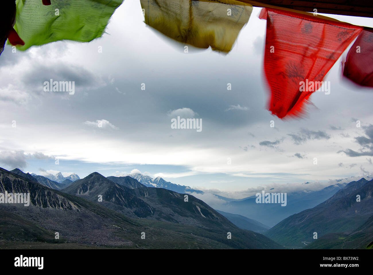 tibetan prayer flags in front of mountain landscape, sichuan, china ...