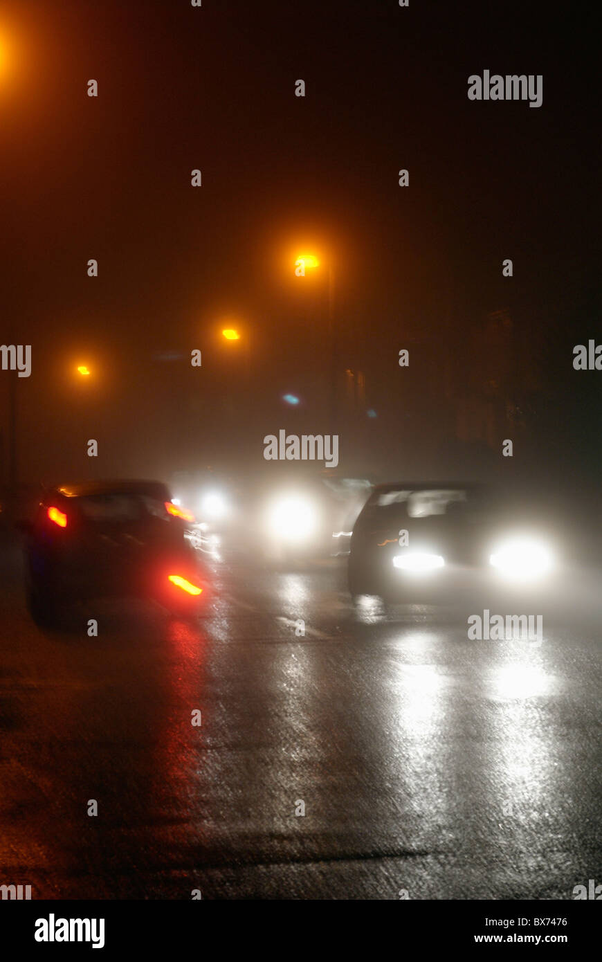 Car with fog light illuminated night UK Stock Photo - Alamy