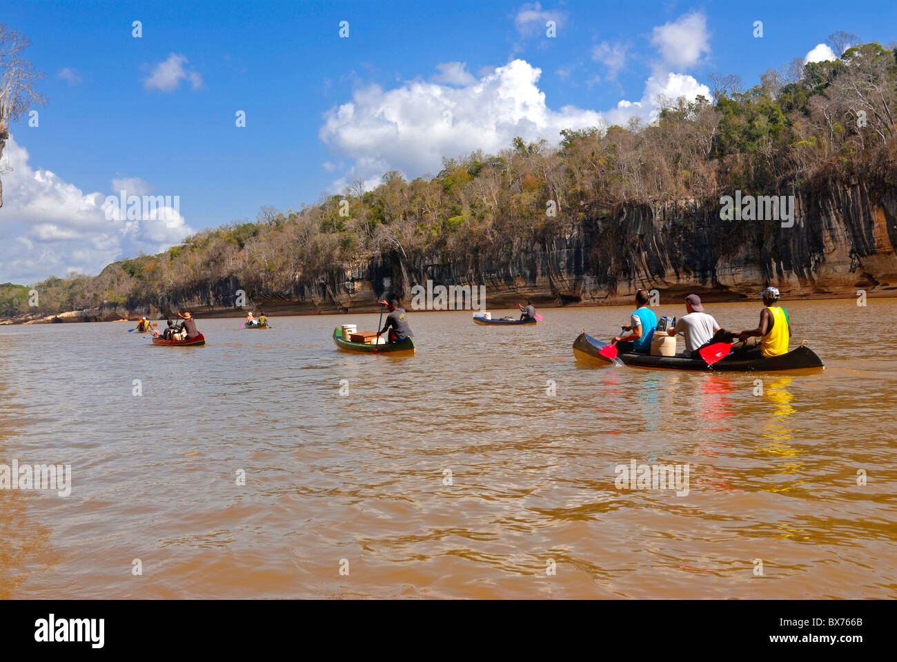 Tourists paddling along the Manambolo River, Tsingy de Bemaraha ...