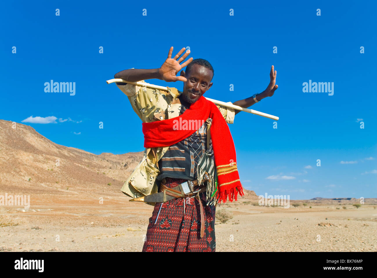 Afar tribesman on his way home, near Lac Abbe, Republic of Djibouti ...