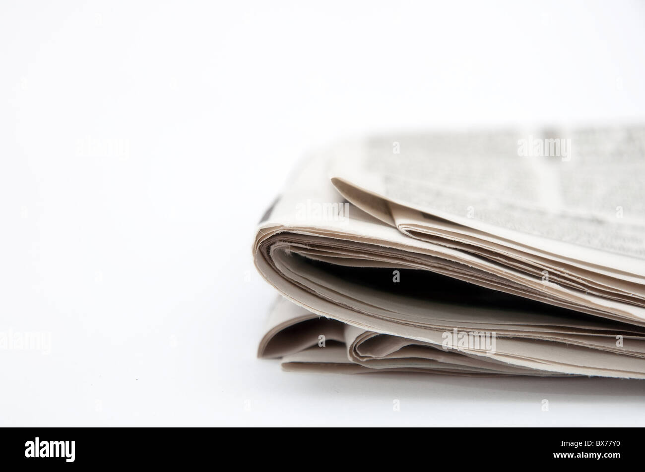 Newspaper folded up hi-res stock photography and images - Alamy
