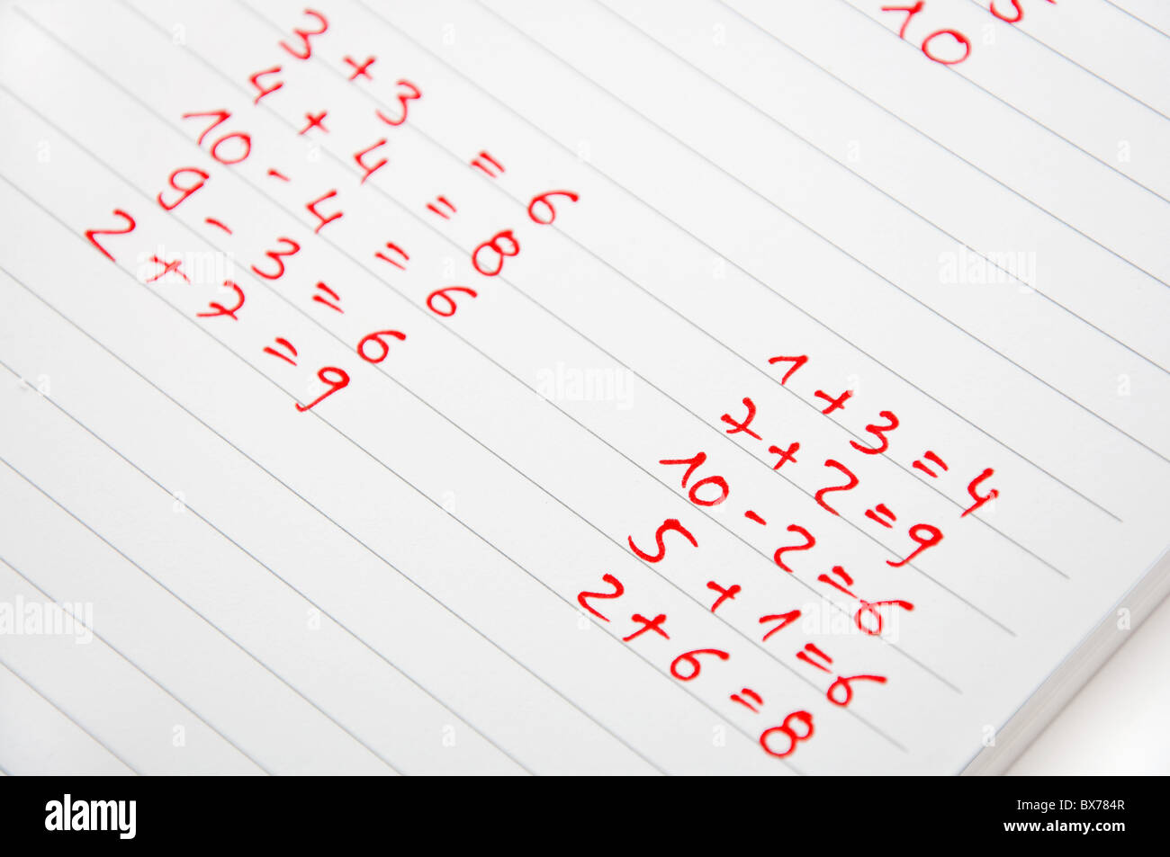A detail from a pupils homework notebook Stock Photo - Alamy