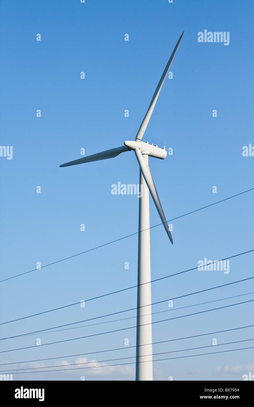 windmill together with high voltage powerlines Stock Photo - Alamy