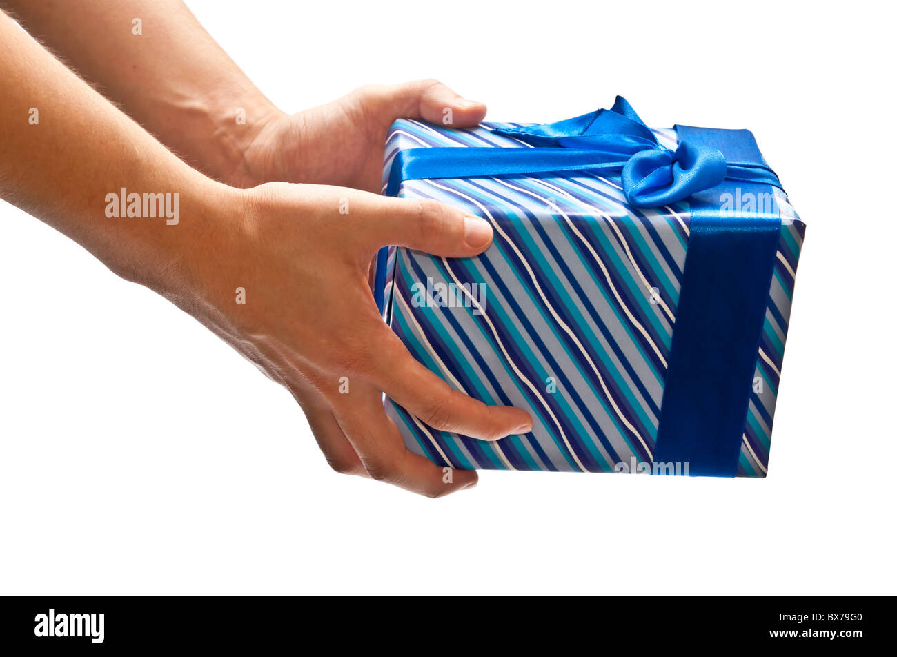 Present in hands Stock Photo - Alamy