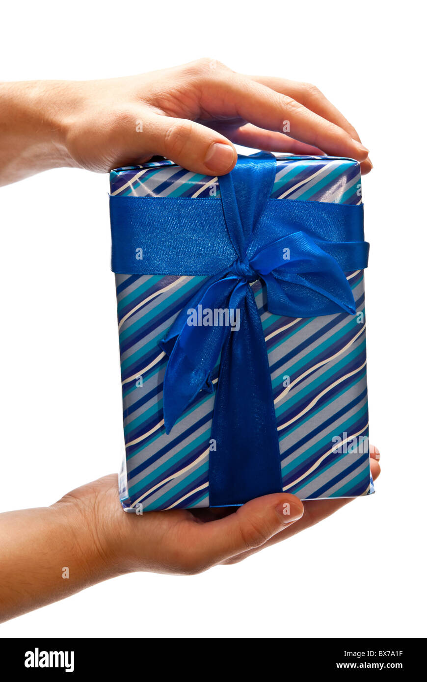 Hands giving birthday present Cut Out Stock Images & Pictures - Alamy