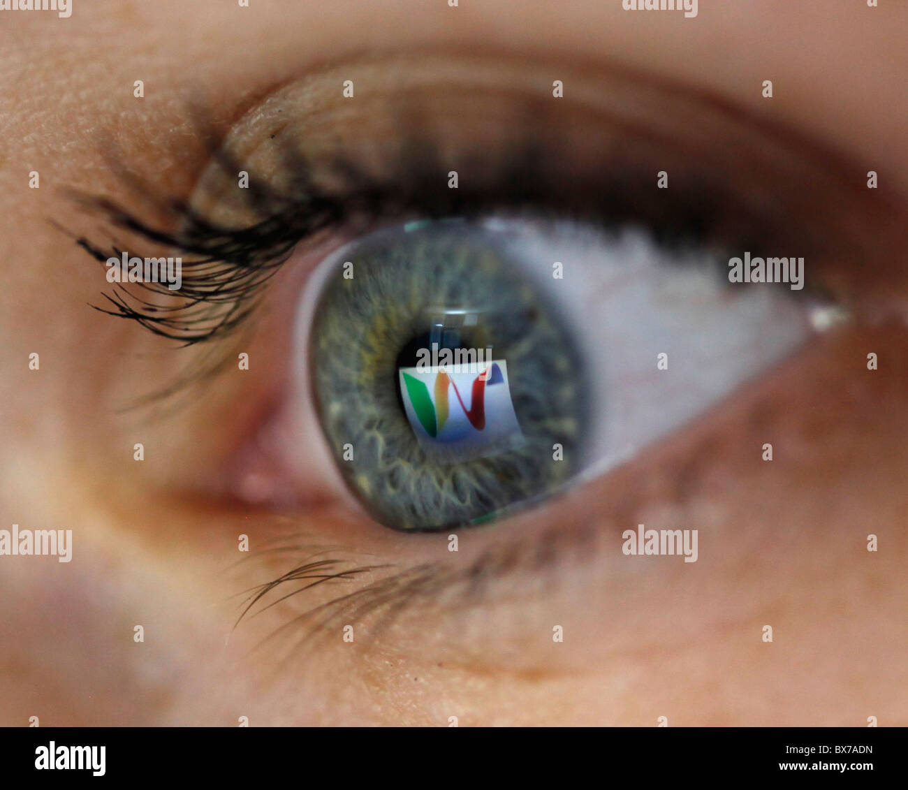 Logo of new social networking website Google Wave seen reflected in ...