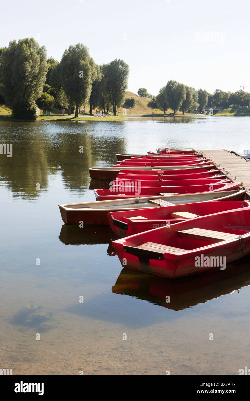 Small boats tied on a jetty Stock Photo - Alamy