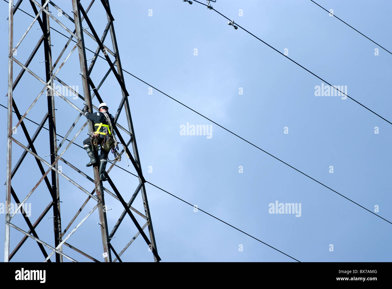 Man working high voltage pylon hi-res stock photography and images - Alamy