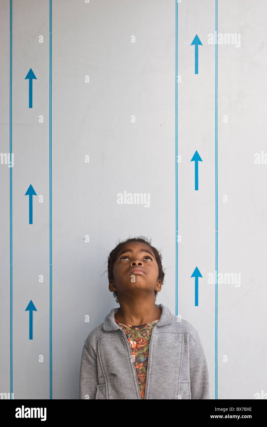 Girl looking up, growing up Stock Photo - Alamy