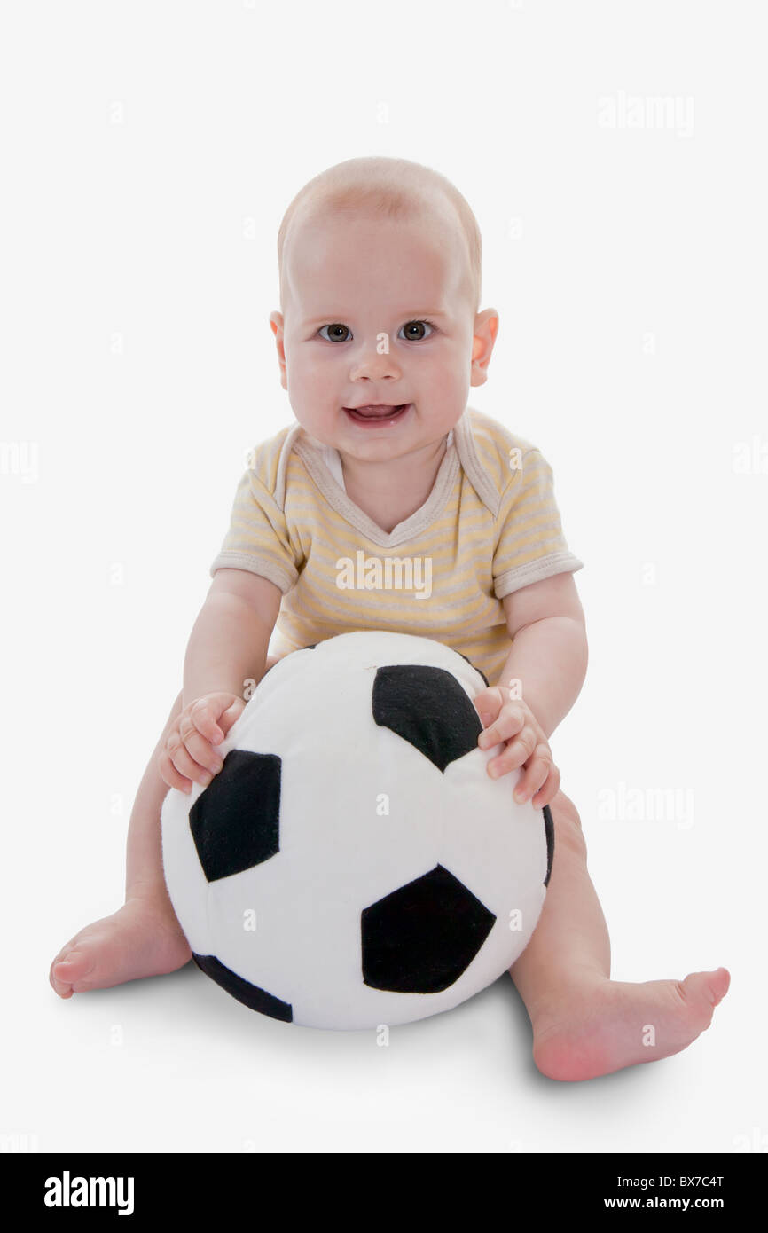 Baby with ball hi-res stock photography and images - Alamy