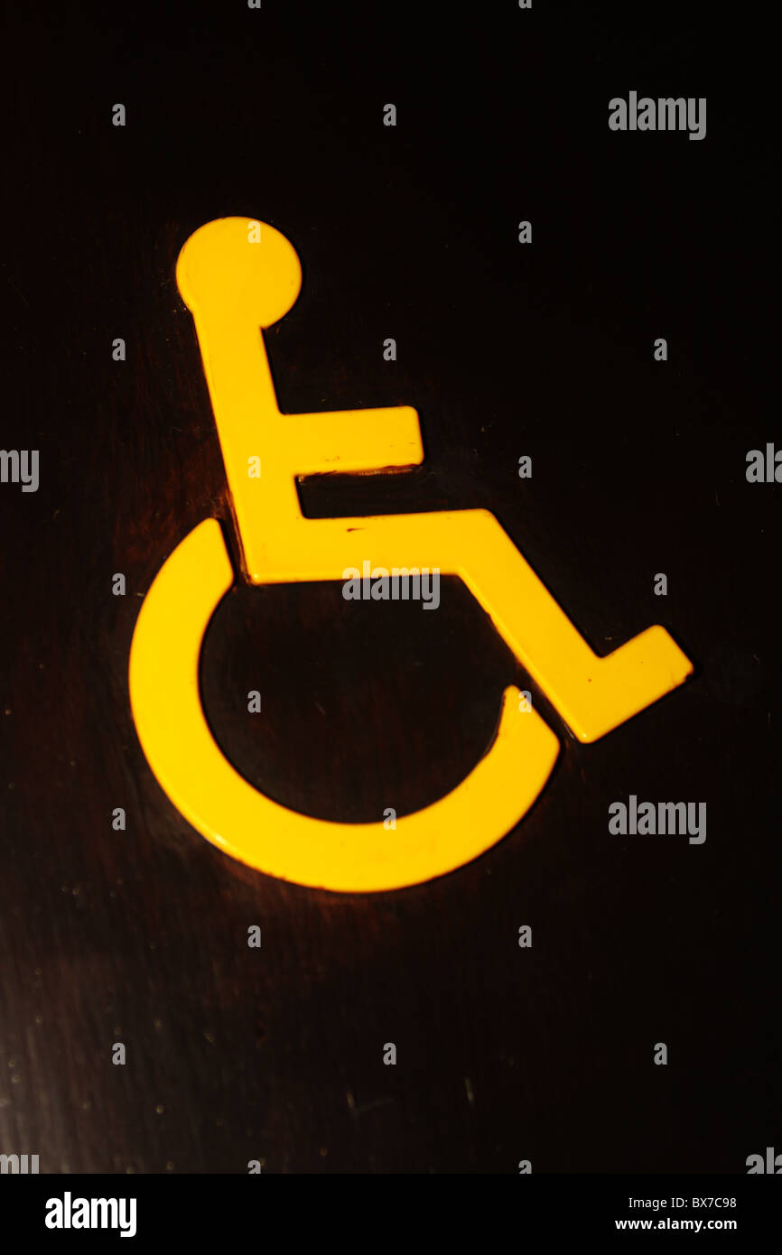 Plastic toilet sign logo disabled Stock Photo - Alamy