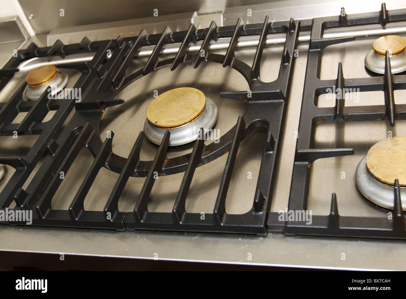 Professional kitchen gas cooker hob Stock Photo - Alamy