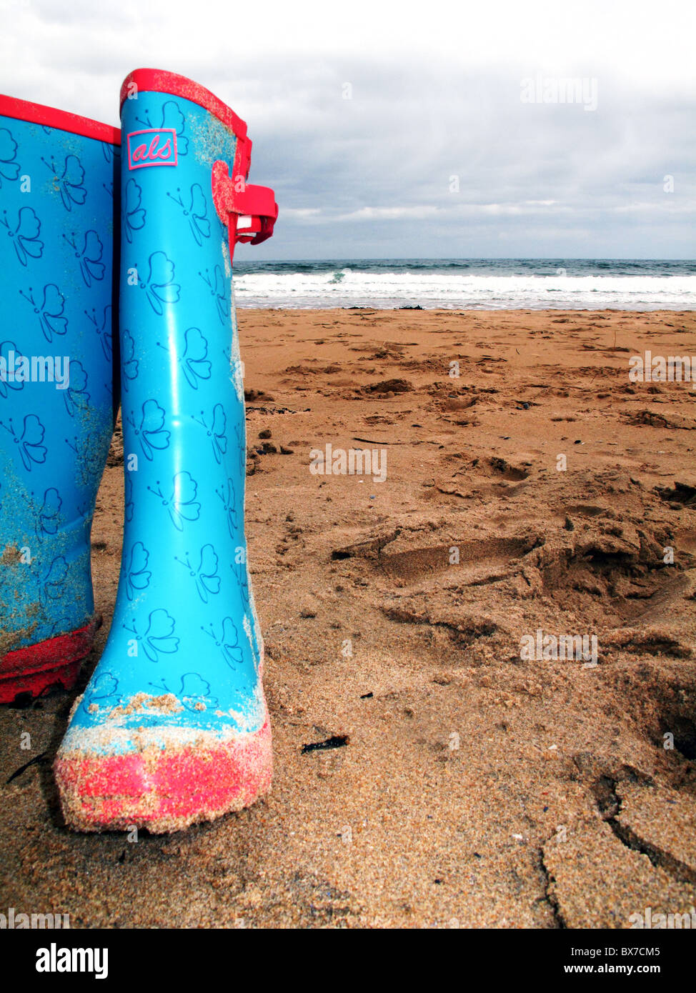 Wellies on beach hi-res stock photography and images - Alamy