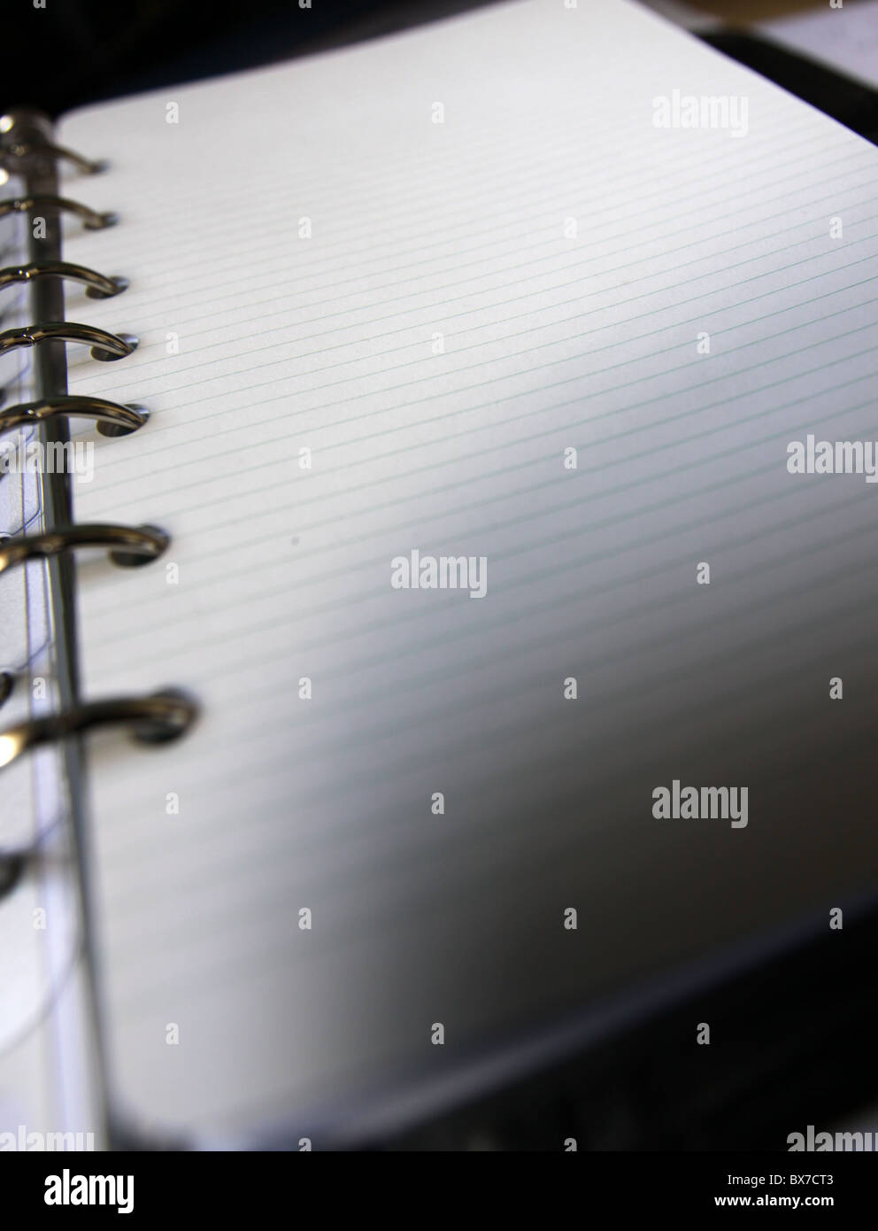 Lined notepaper in ring bound folder Stock Photo - Alamy