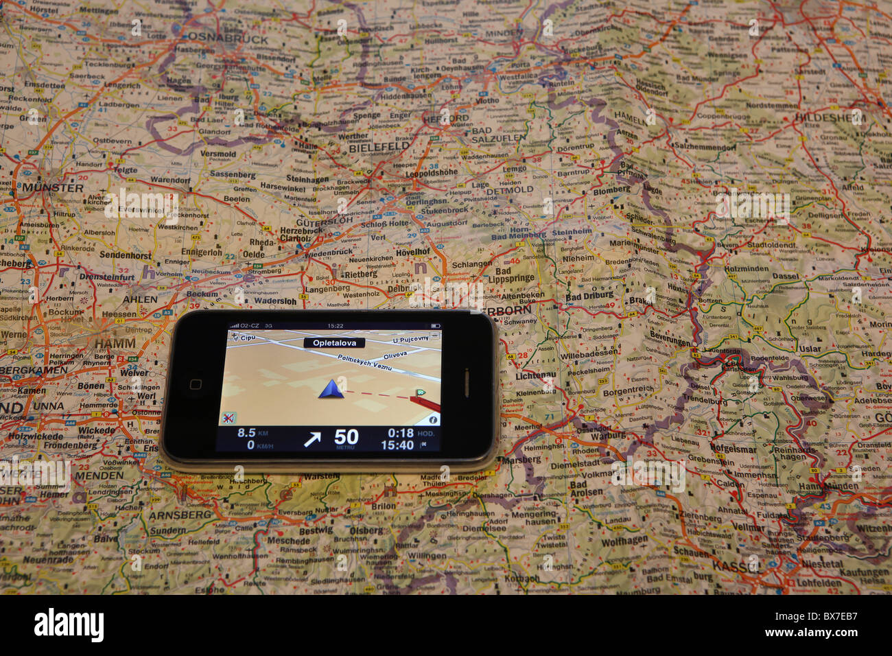 GPS navigation placed on a map Stock Photo - Alamy
