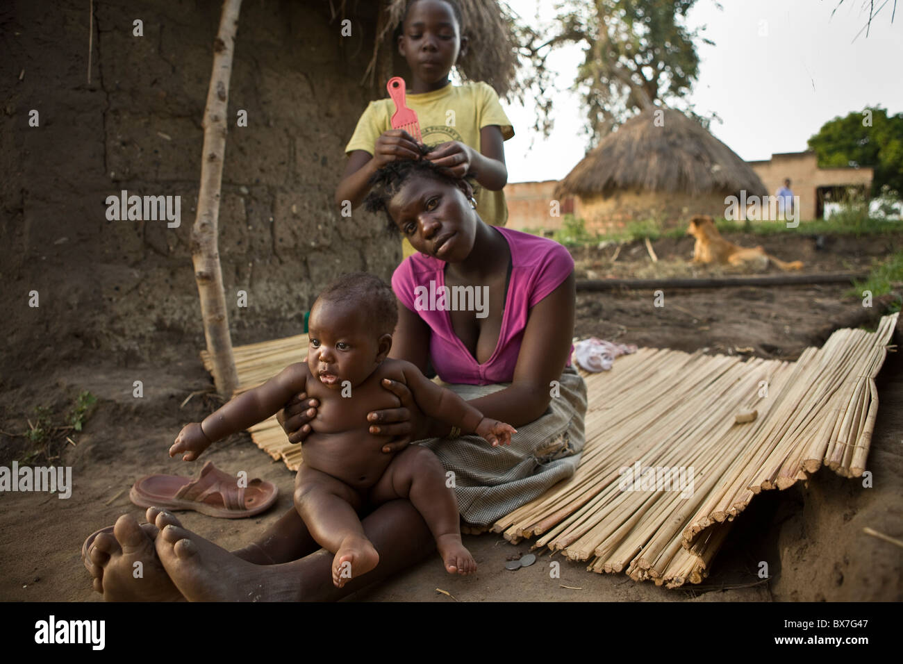 Family in a village in northern Uganda Stock Photo - Alamy