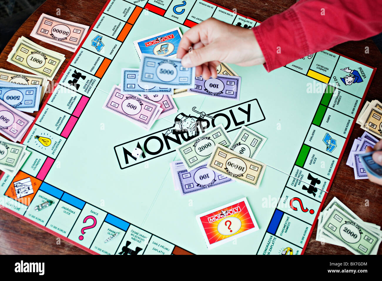 Monopoly, table (round) game Stock Photo - Alamy
