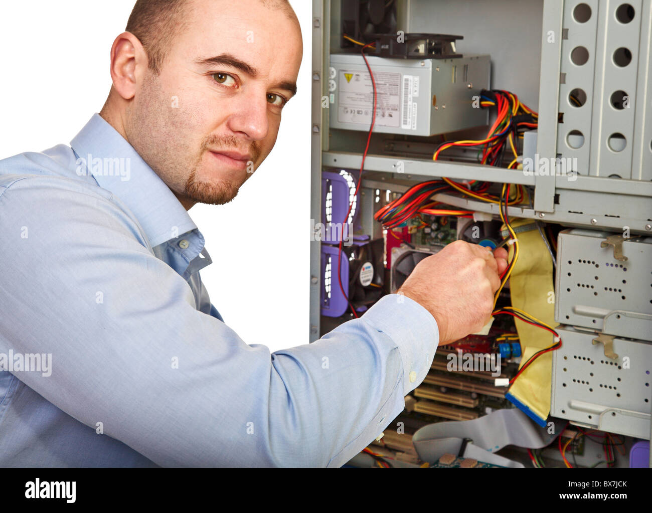 young worker on duty repair pc Stock Photo - Alamy