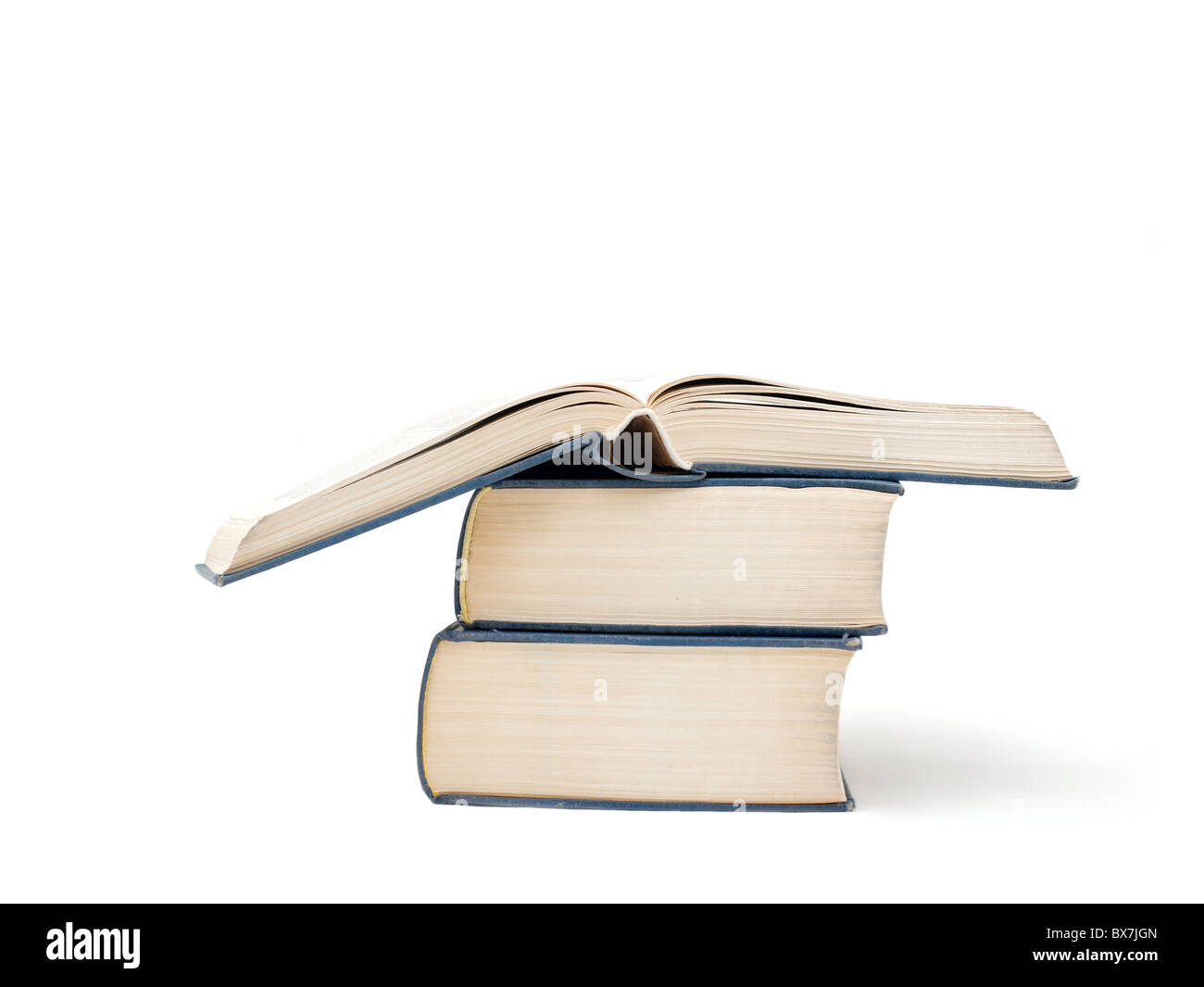 Pile of thick books isolated on white Stock Photo - Alamy