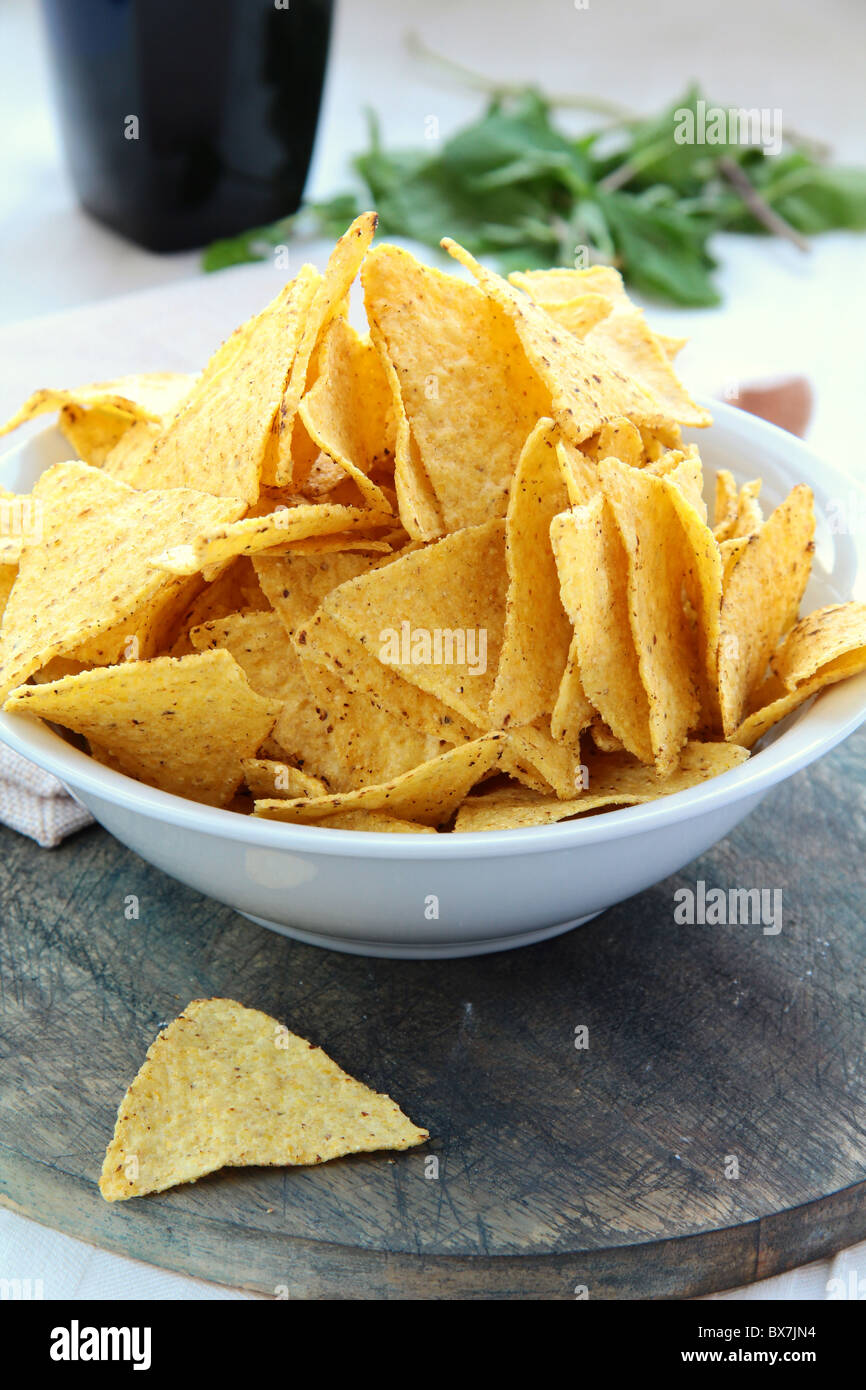 Mexican corn chips in a white cup Stock Photo - Alamy