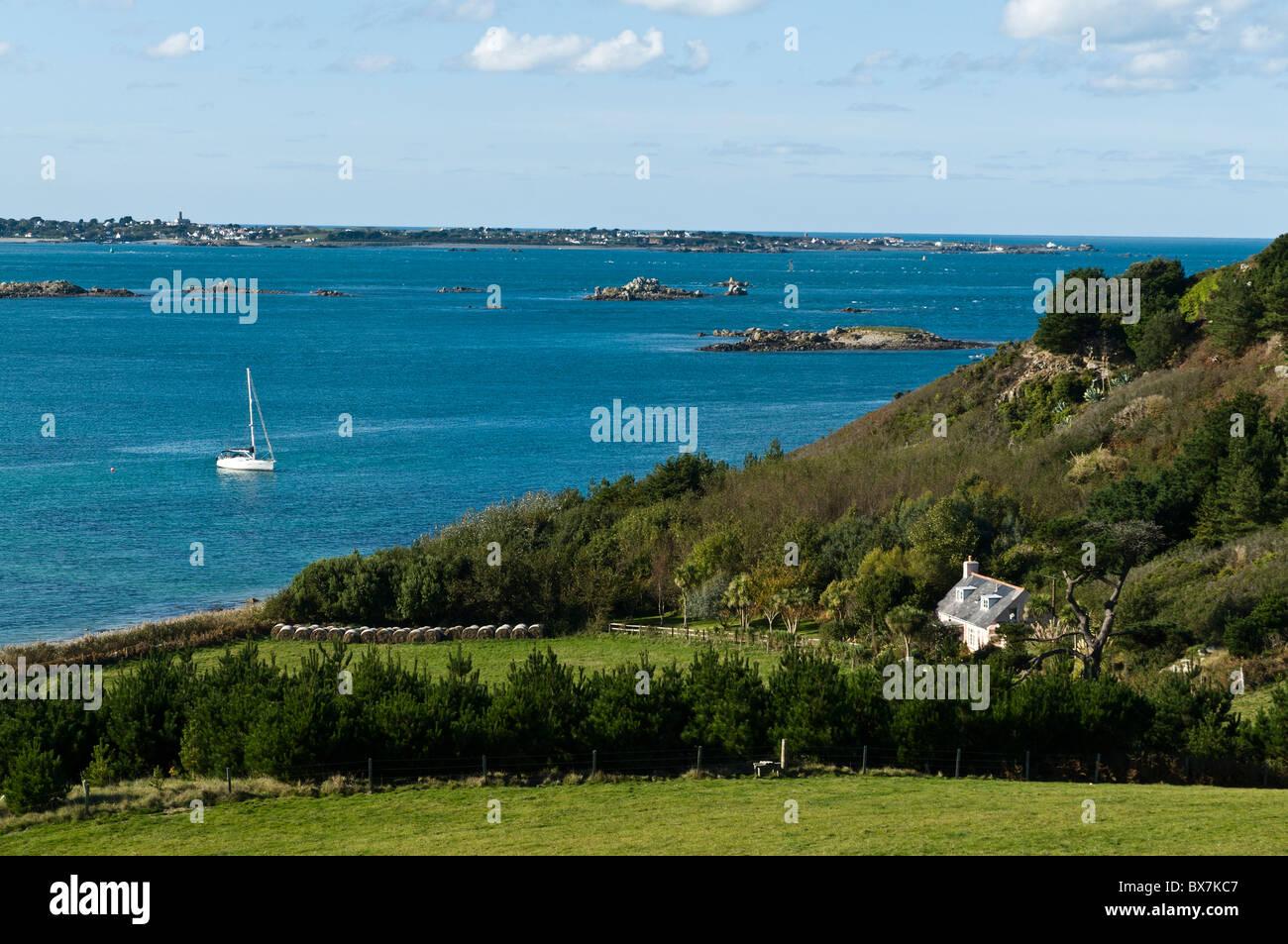 dh Herm Island HERM GUERNSEY Yacht and cottage overlooking fields and ...