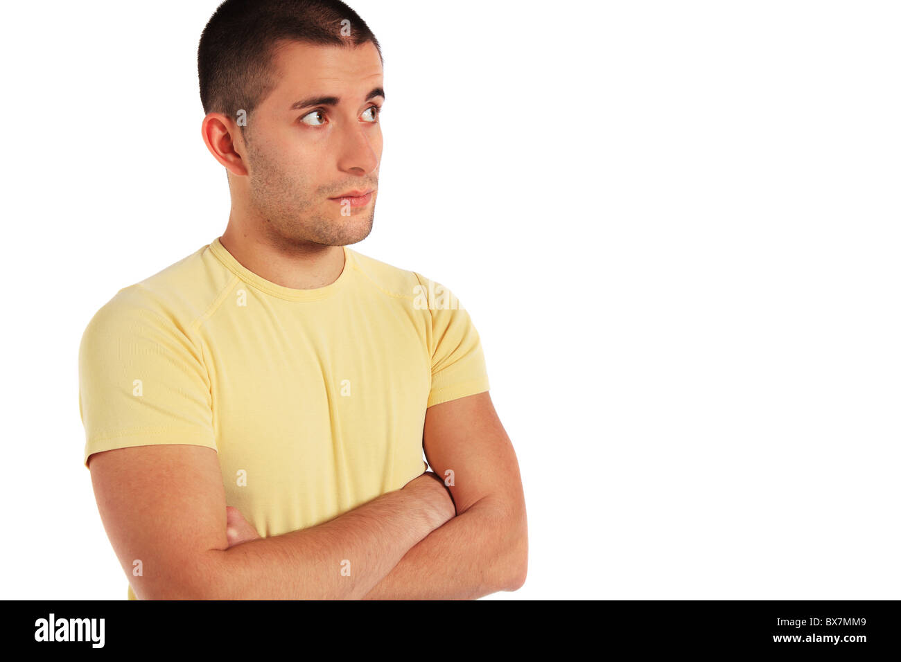 Attractive young man looking sceptical. All isolated on white ...