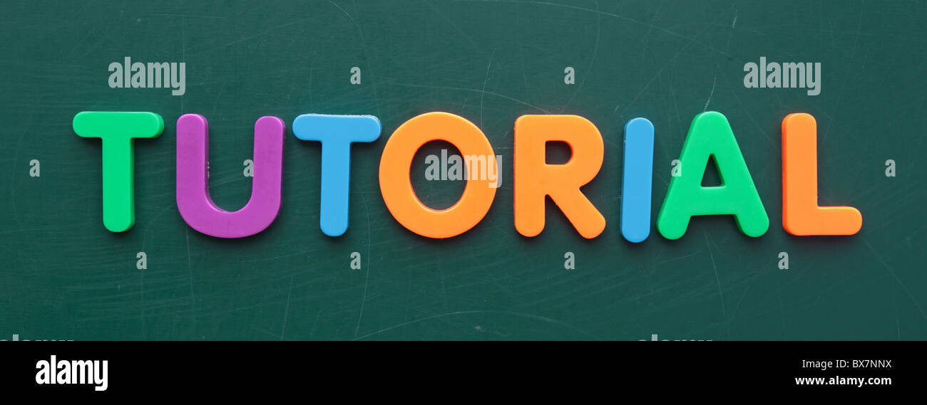 The term tutorial in colorful letters on a blackboard Stock Photo - Alamy