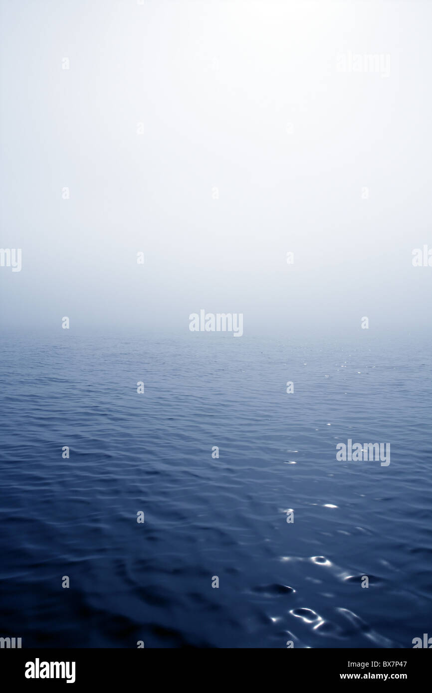 Blue fog sea in a foggy day with low ocean visibility Stock Photo - Alamy