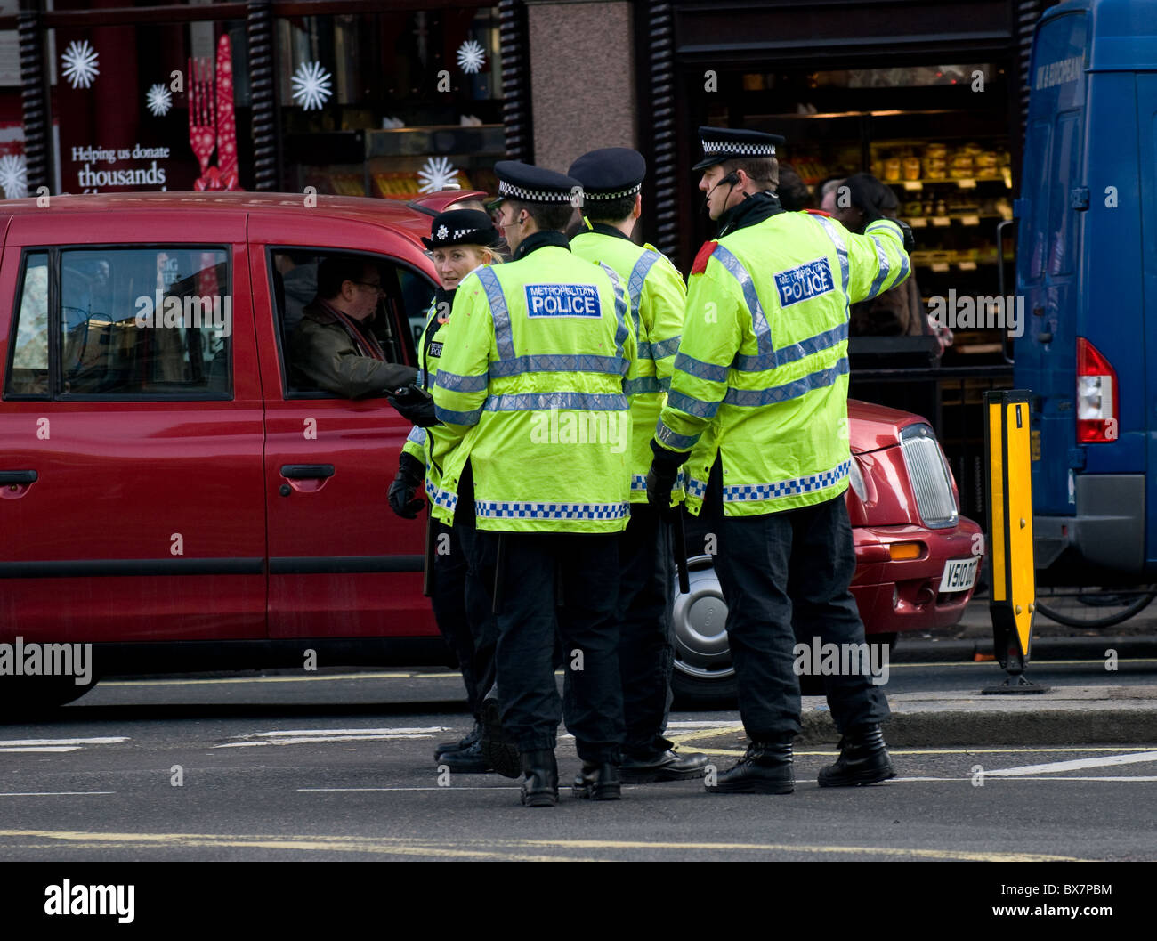 Metropolitan police officers on duty in London Stock Photo - Alamy