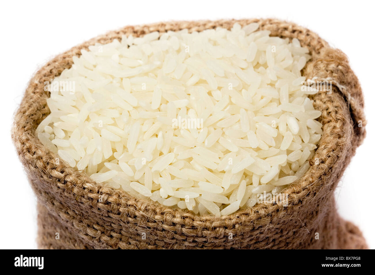 White long rice in small burlap sack Stock Photo - Alamy