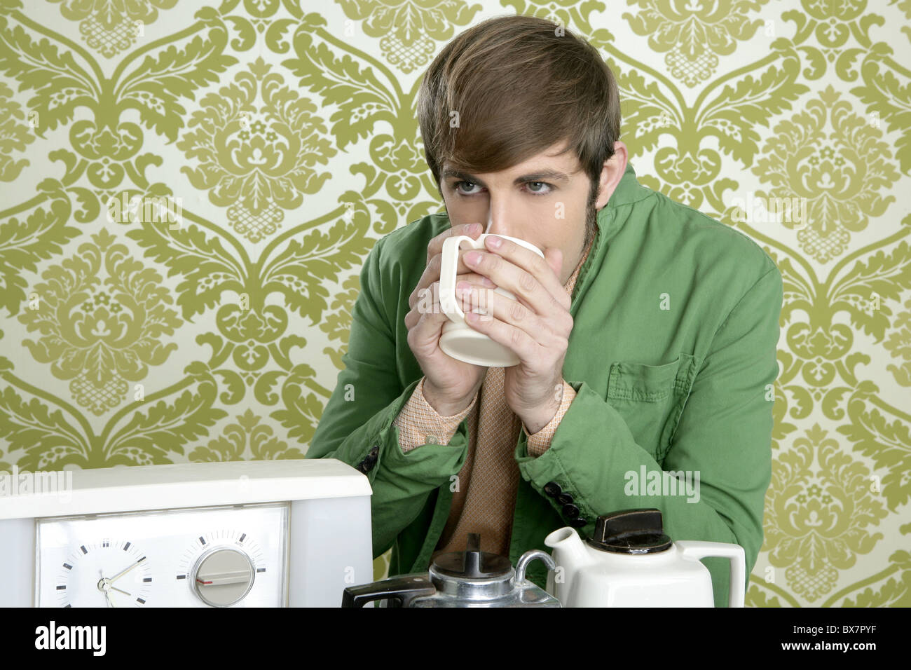geek retro man drinking tea coffee vintage teapot in wallpaper Stock ...