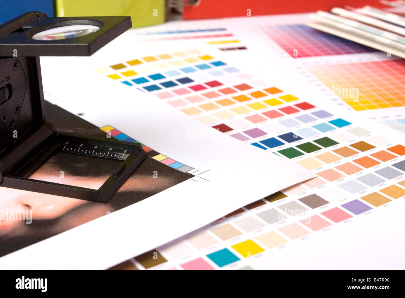 typical graphic designers desk checking a printers proof Stock Photo ...