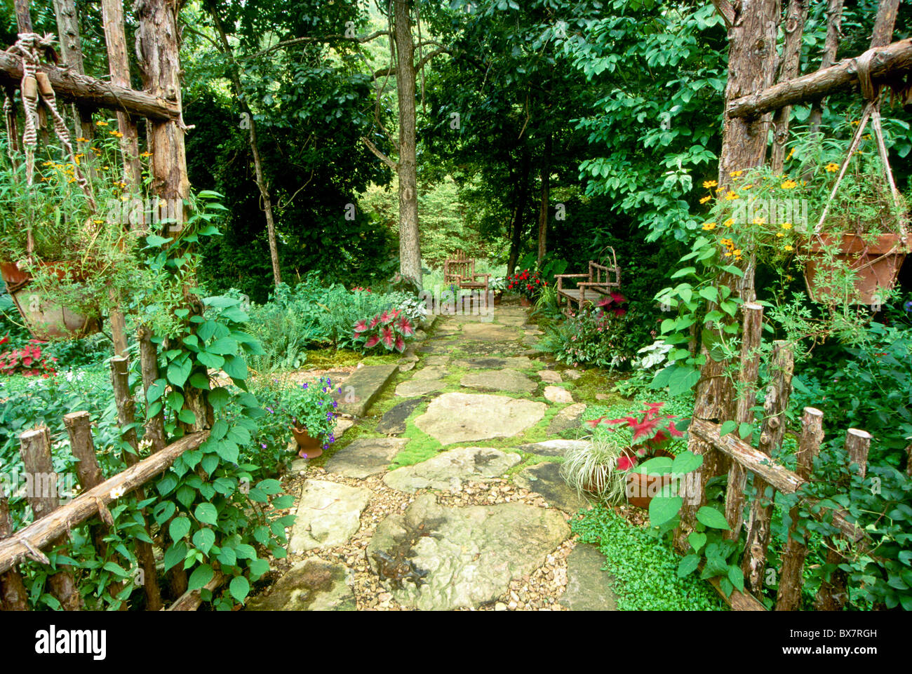 Walking through the handmade cedar archway into the shade garden to sit ...