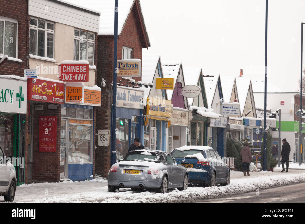 local shops in village in the snow Stock Photo - Alamy