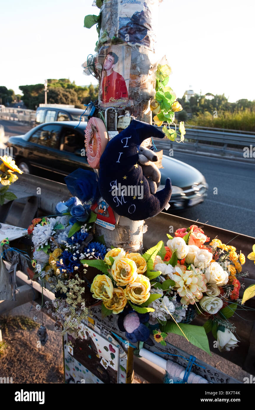 Flowers on roadside ground of Rome Italy street, as memorial of fatal ...