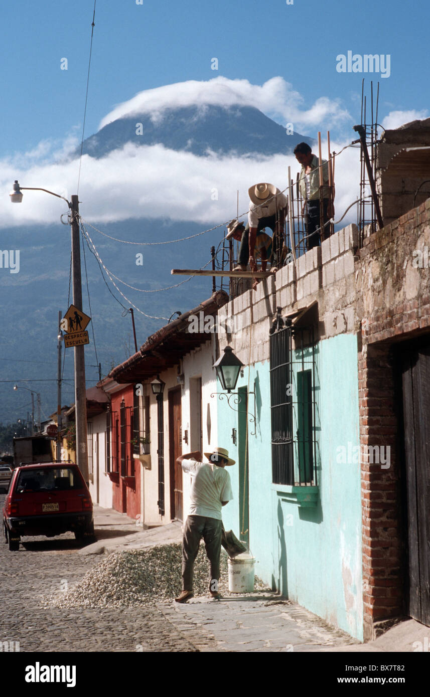 GUATEMALA MEN WORKING IN RESTORATION OF COLONIAL HOUSES IN ANTIGUA WITH ...