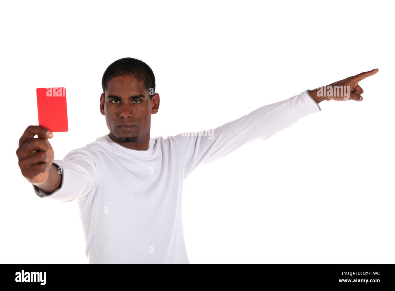 An attractive dark-skinned man showing the red card. All on white ...